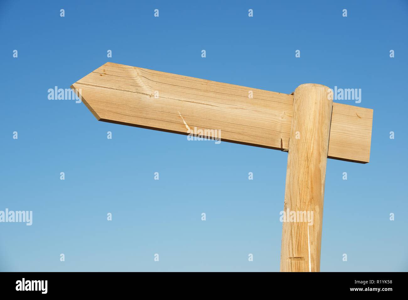 View of a directional wood signal Stock Photo - Alamy