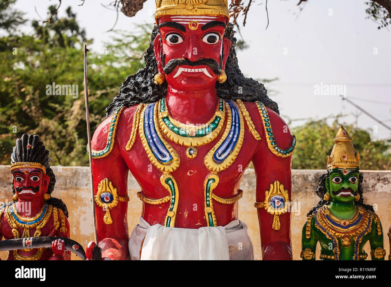 Indian hinduistic sculptures close to holy temple at the countryside of ...