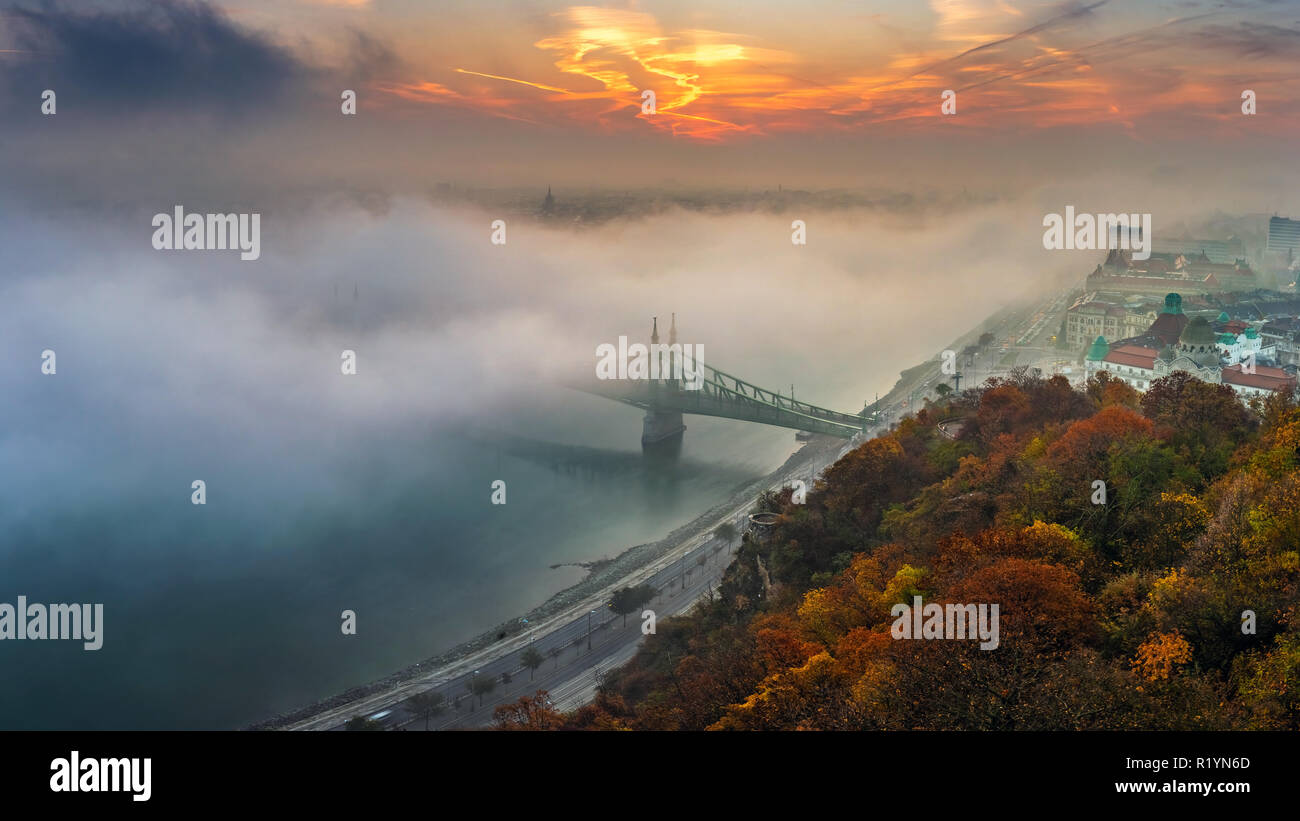 Budapest, Hungary - Panoramic view of mysterious foggy sunrise with ...