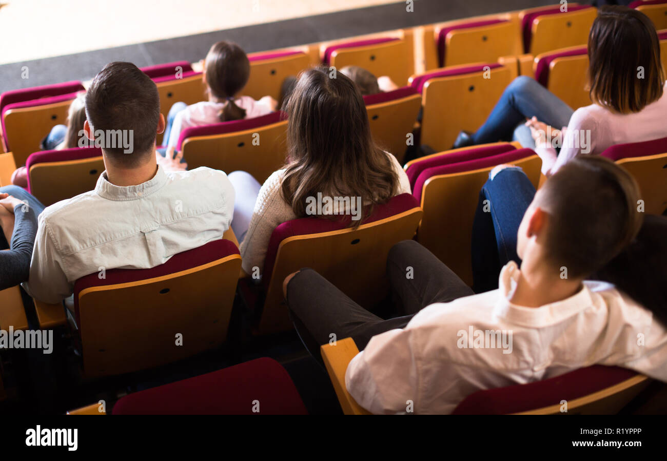 Adult audience expecting movie to begin in cinema Stock Photo - Alamy