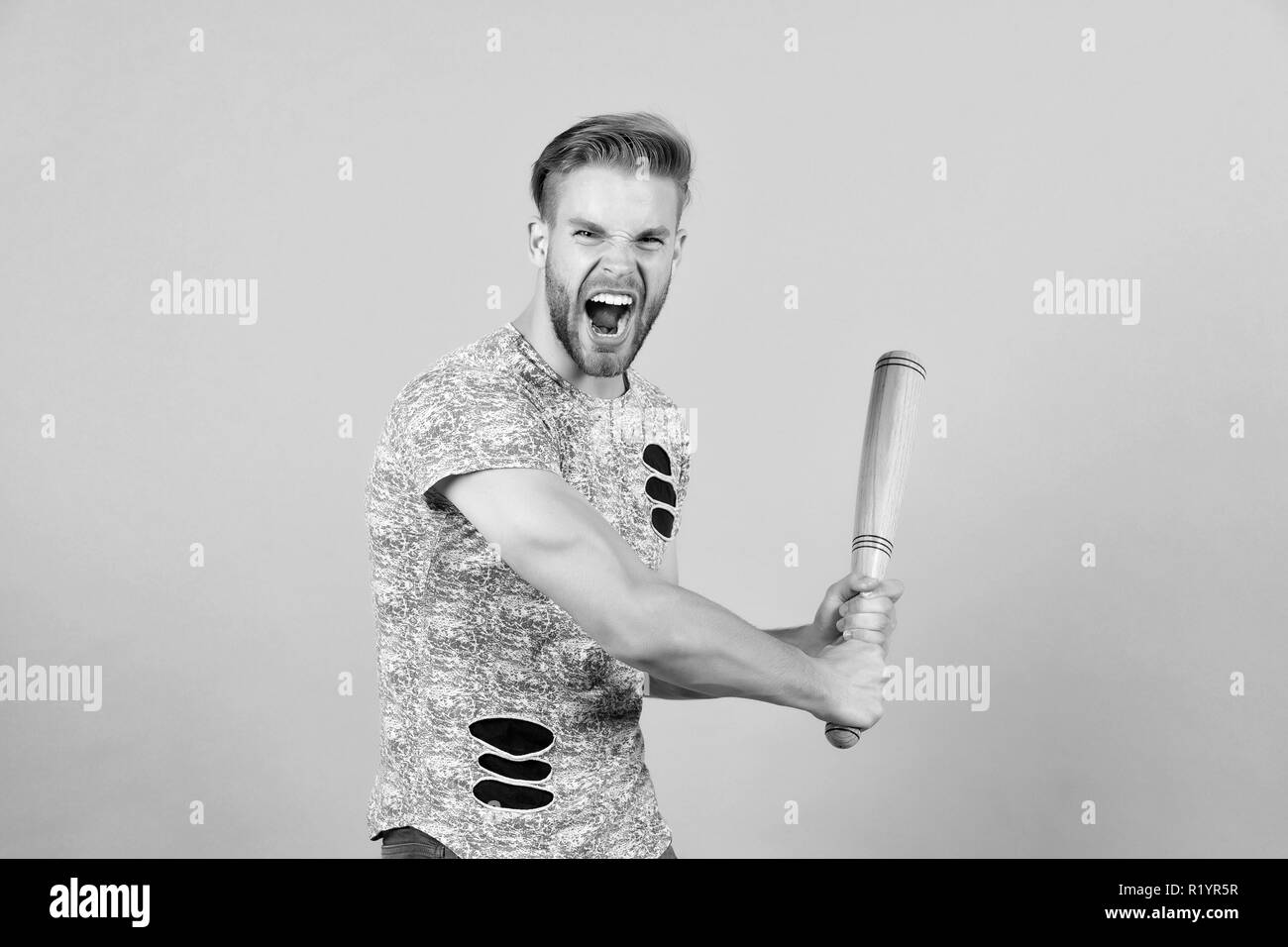 Bully man shouting aggressive face, grey background. Man with wooden ...