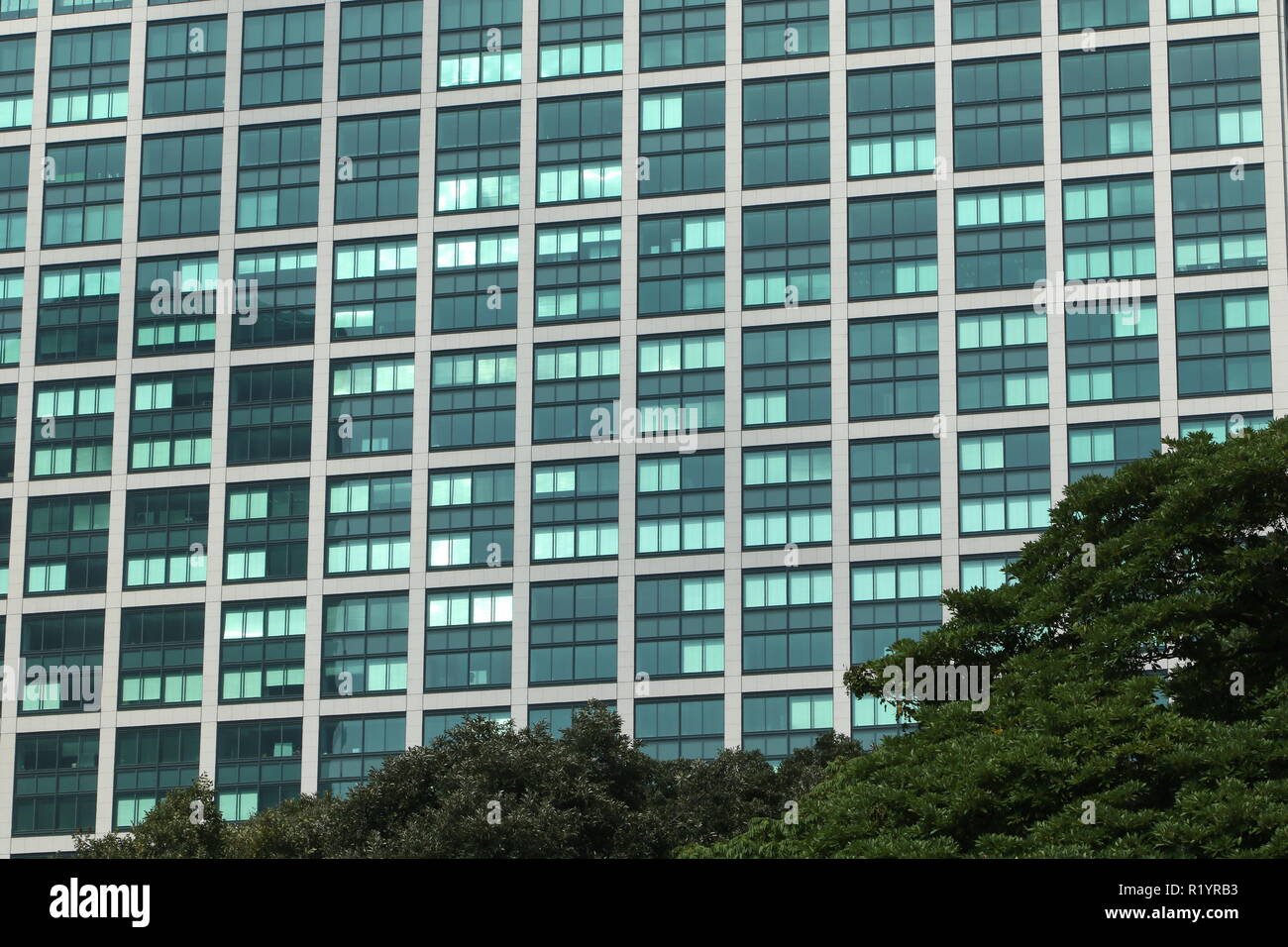 Architecture in glass tokyo wall background hi-res stock photography ...