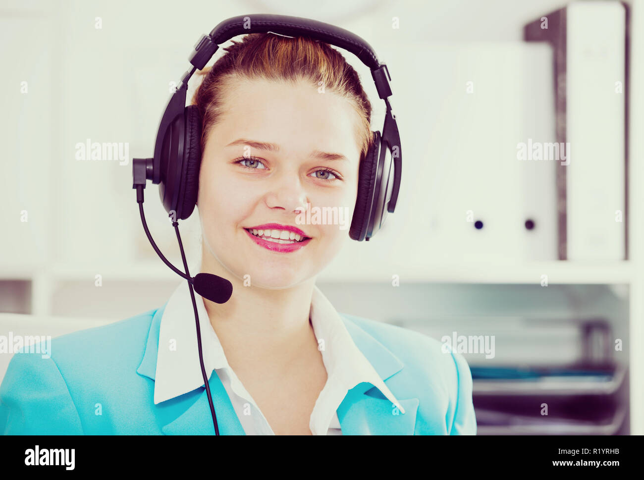 Portrait of dispatcher female which is talking with client in the ...