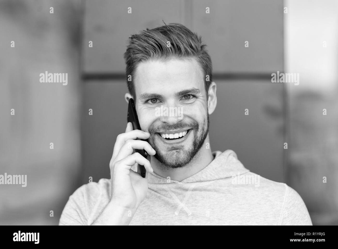 I was waiting for your call. Man beard with smartphone, urban ...