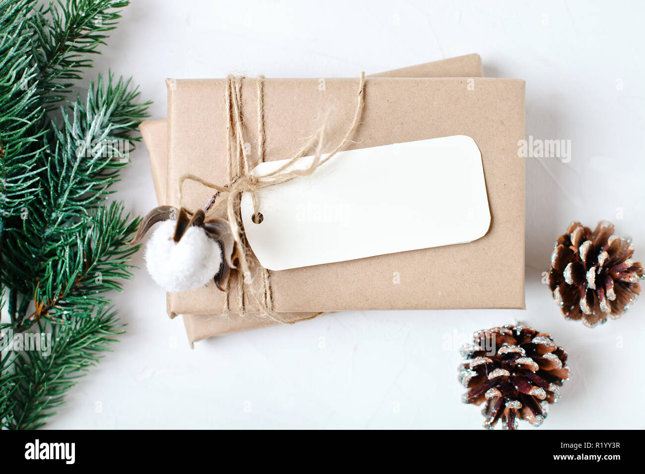 Merry Christmas and happy New year. Mockup with postcard and branches ...