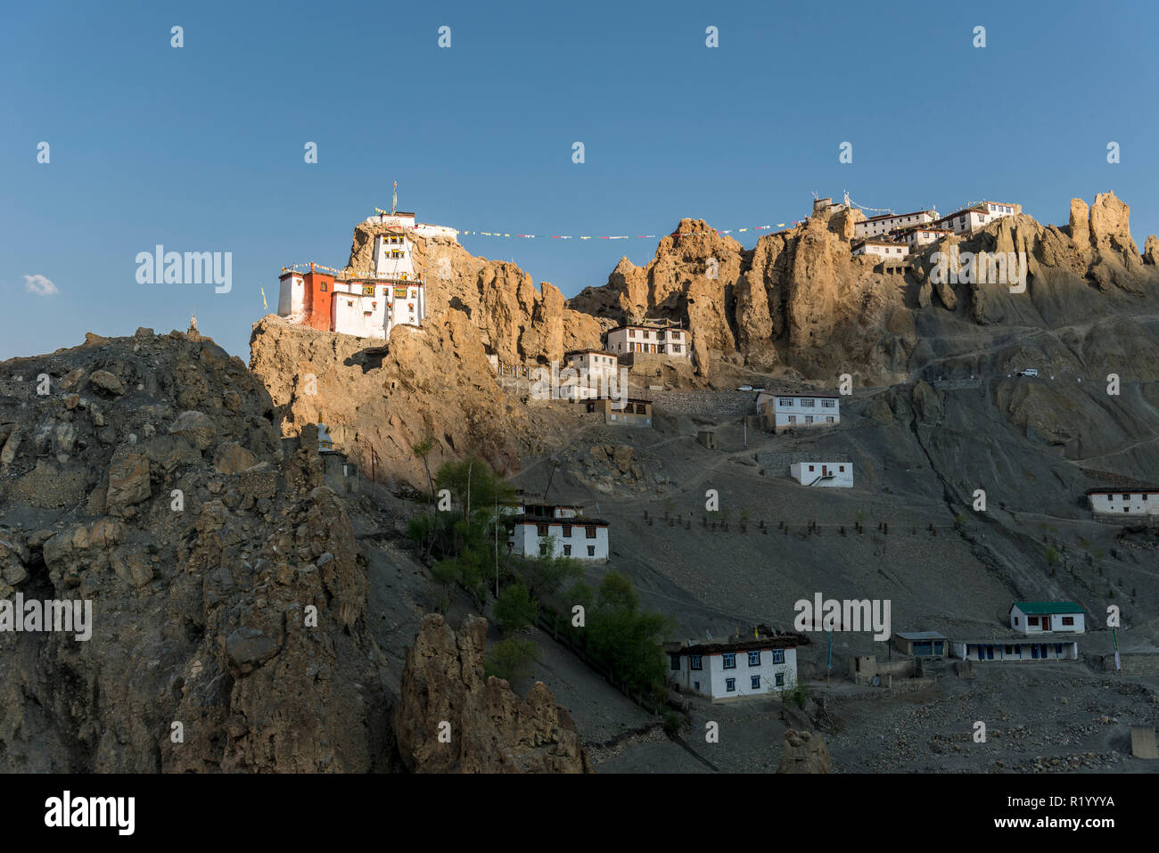 The first light of the day shining on Dankhar Gompa, a Tibetan Buddhist ...