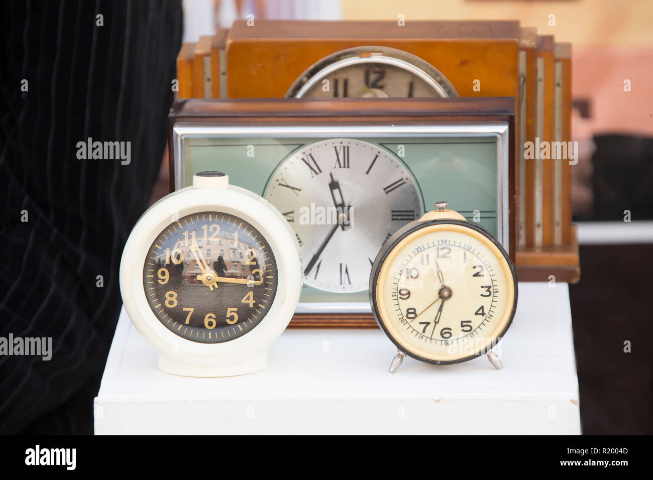 Vintage table clock round and square Stock Photo - Alamy