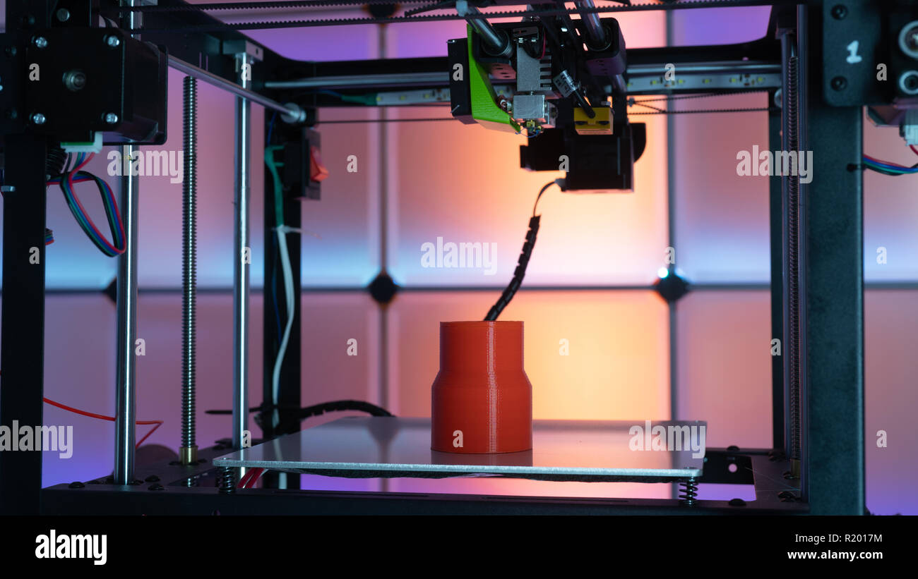 3d printer and plastic filament on color background Stock Photo - Alamy