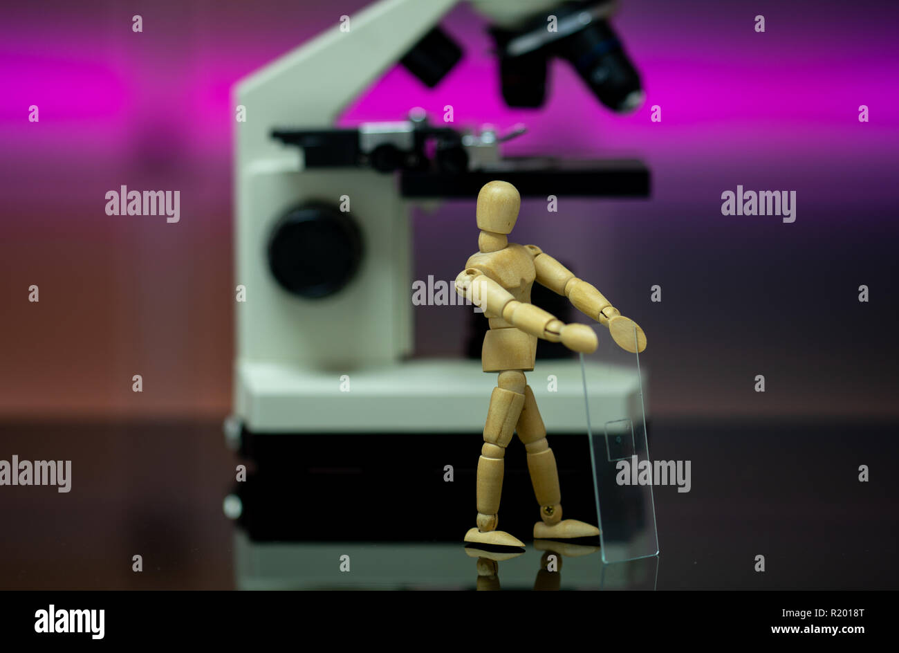 hinge drawing doll man and microscope Stock Photo - Alamy