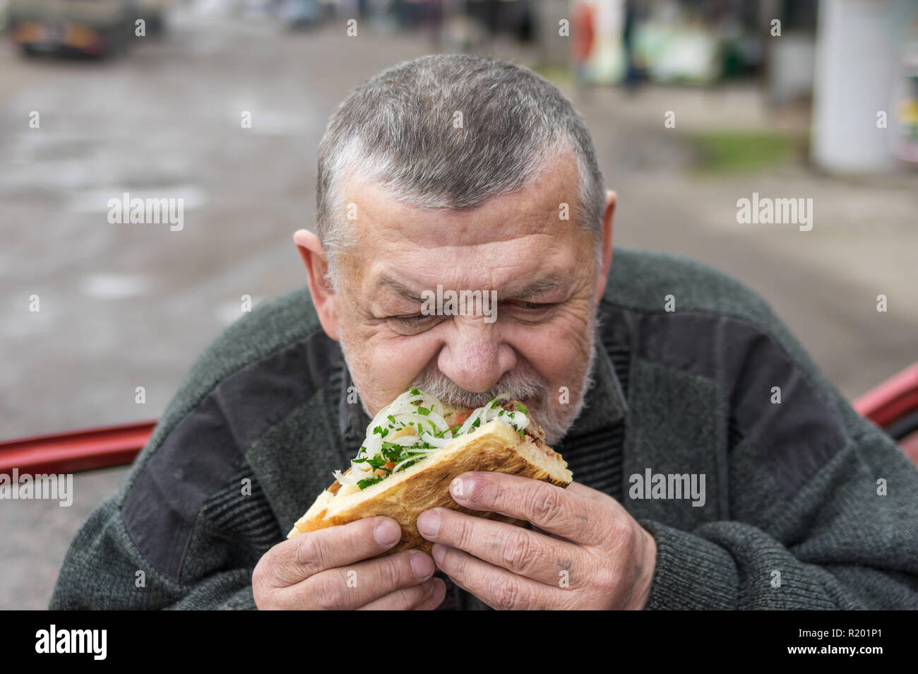 Fat man eating kebab hi-res stock photography and images - Alamy