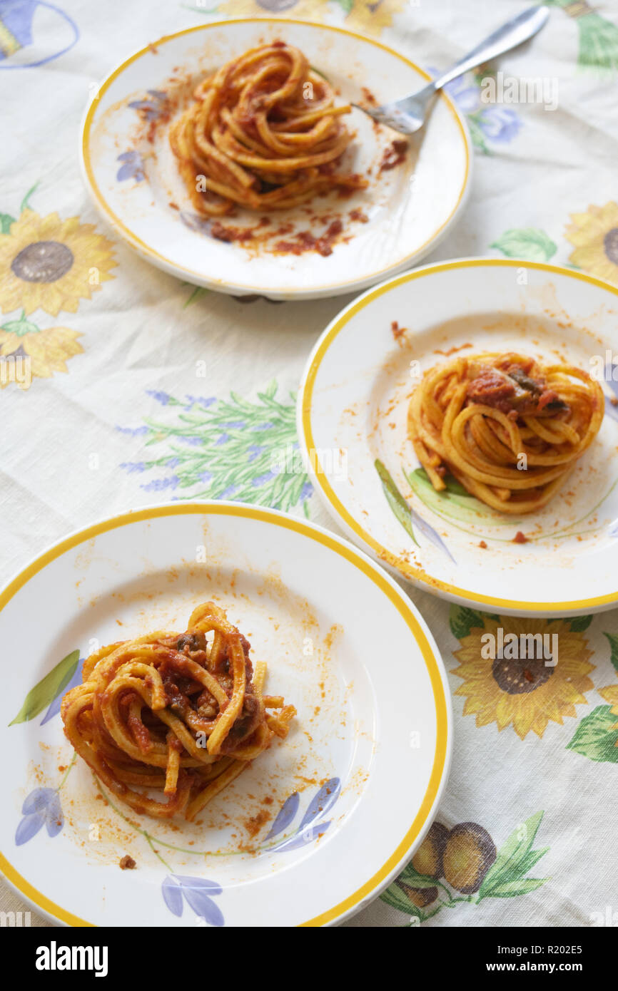 egg tonnarelli seasoned with tomato sauce Stock Photo - Alamy
