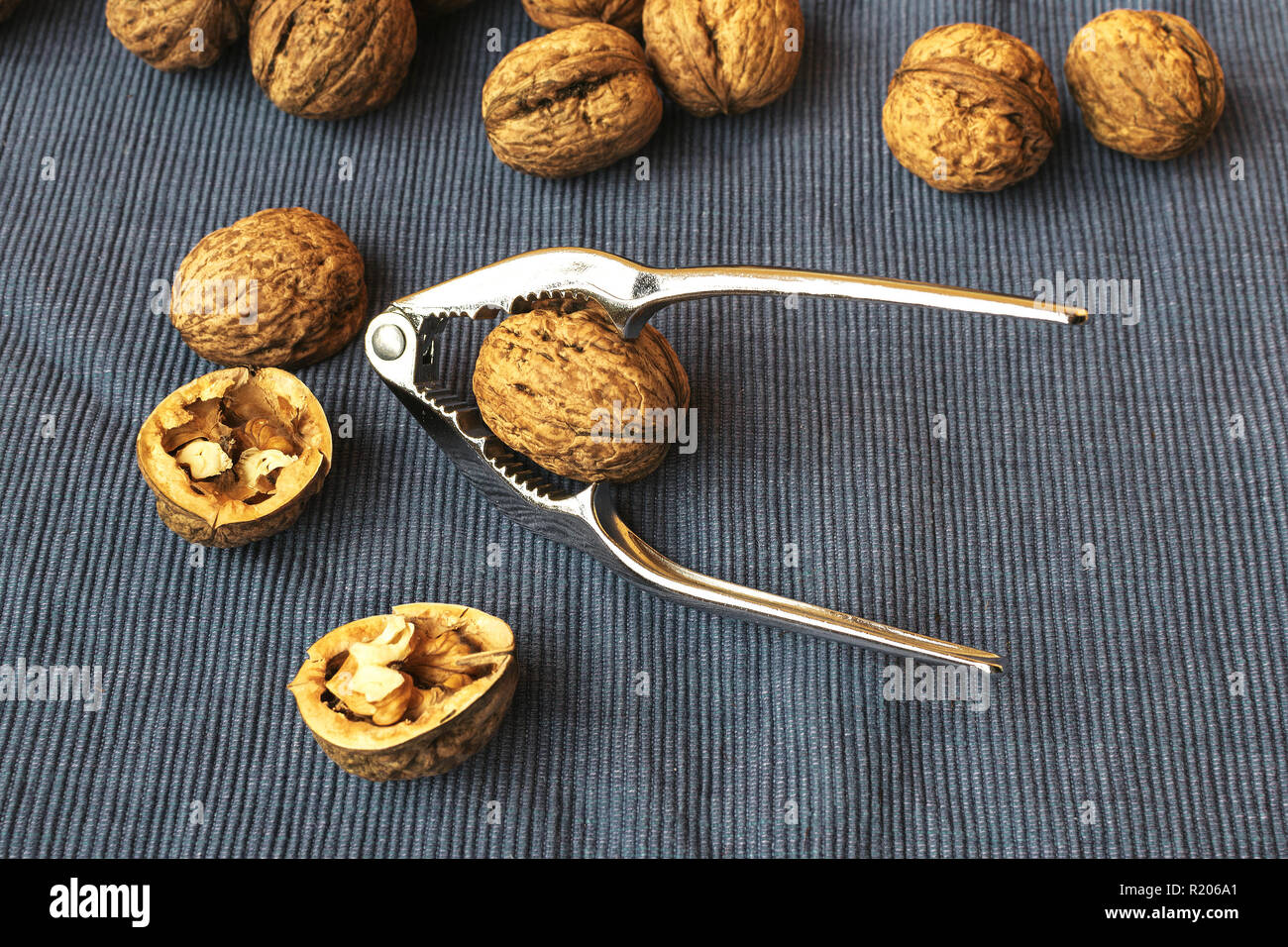 Cracking nuts dark hi-res stock photography and images - Alamy