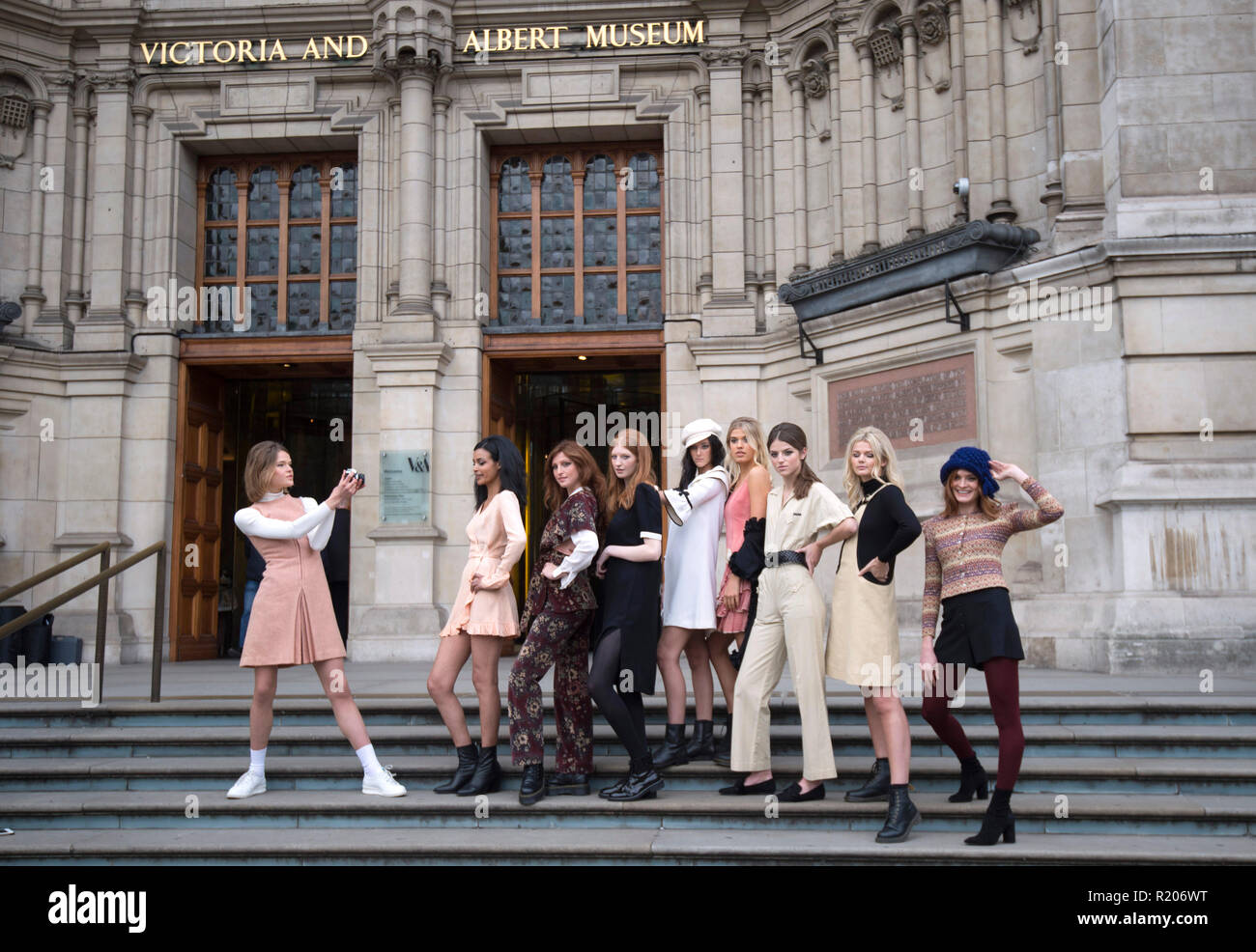 Models pose on the steps of the Victoria and Albert Museum, London ...