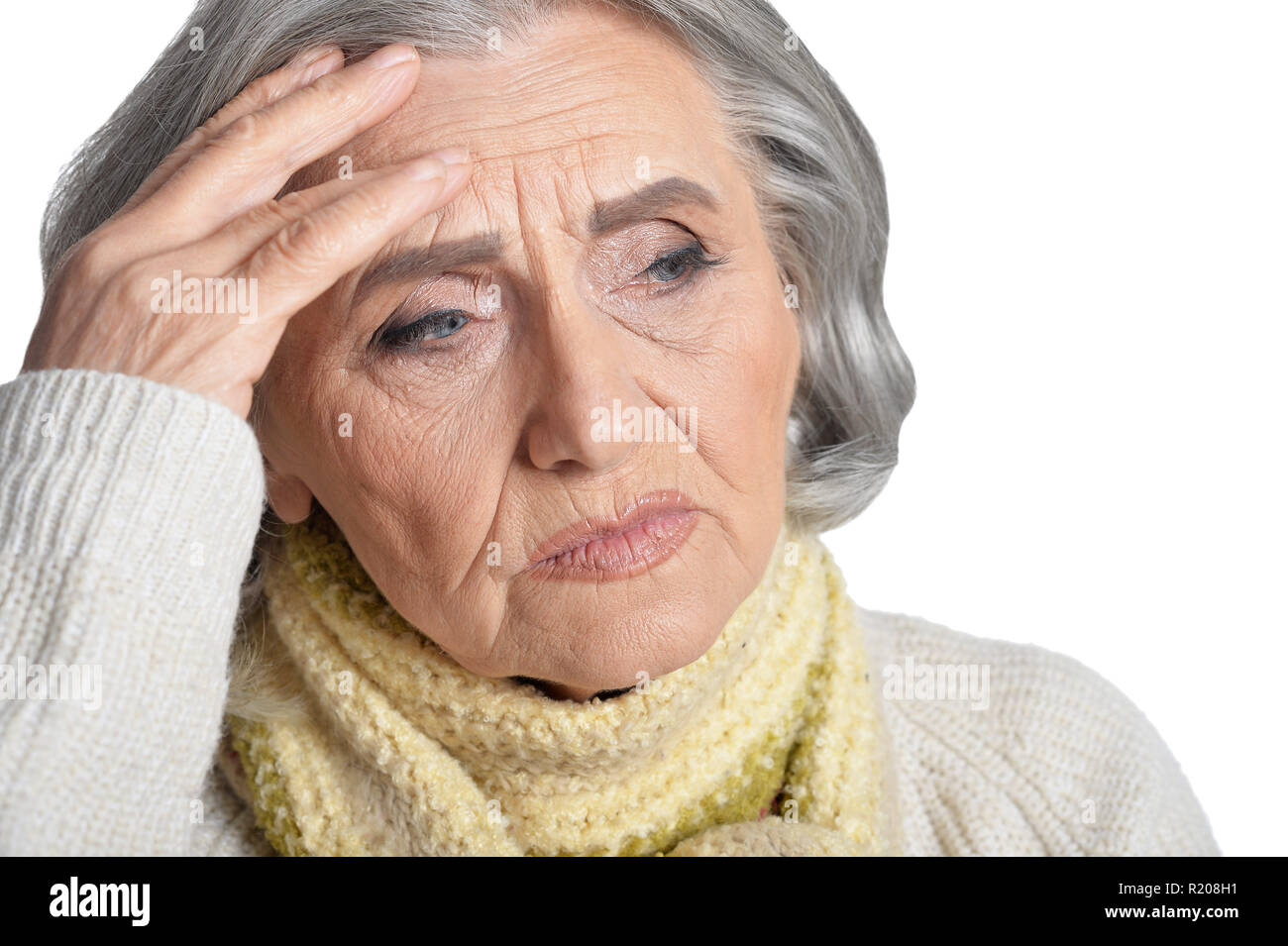 Sad senior woman isolated on white background Stock Photo - Alamy