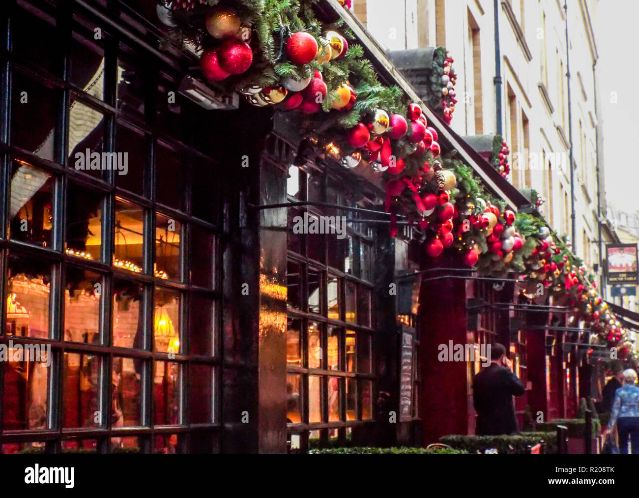Pub Exterior With Christmas Decorations Of Red Gold Silver Baubles Pub Exterior With Christmas Decorations Of Red Gold Silver Baubles