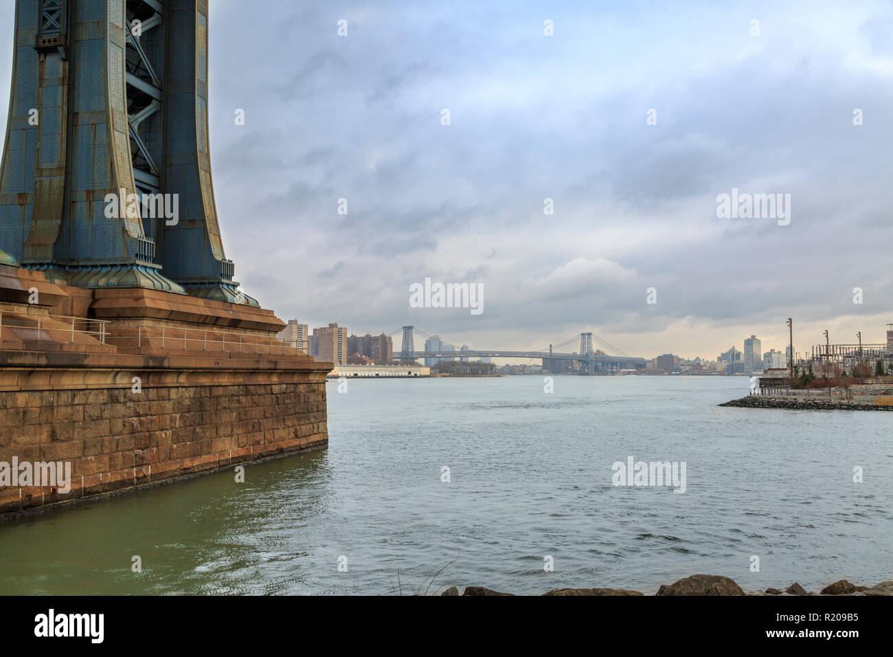 Manhattan bridge under and williamsburg bridge in distance from brooklyn in New York, NY, USA ...