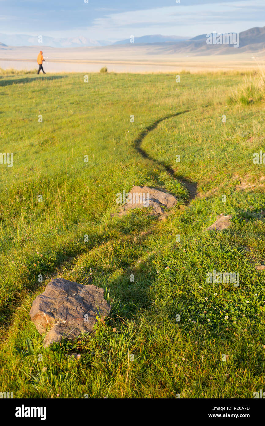 panoramic view of nice green hill and path on blue sky background Stock ...