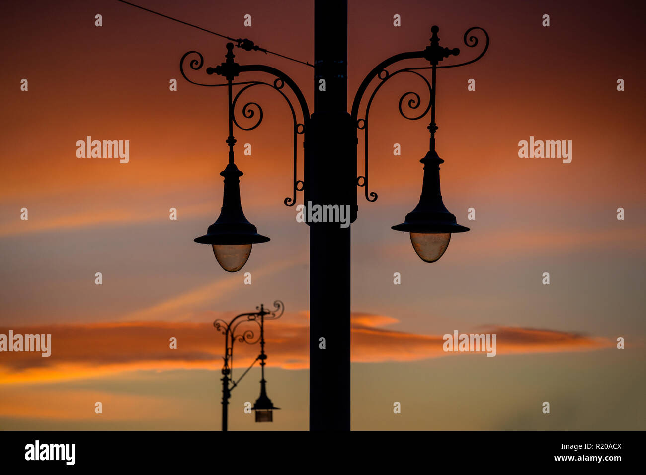 Street light at sunset Stock Photo - Alamy