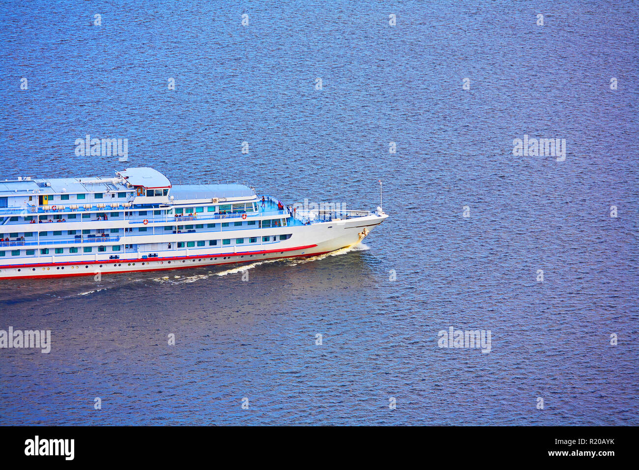 Large Cruise ship sailing across sea Stock Photo - Alamy