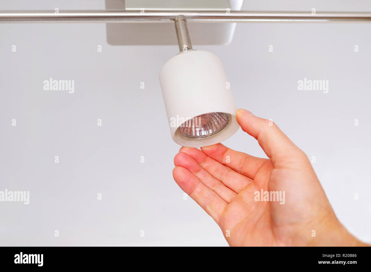 Electrical engineers are installing ceiling lamps in the hallway Stock ...