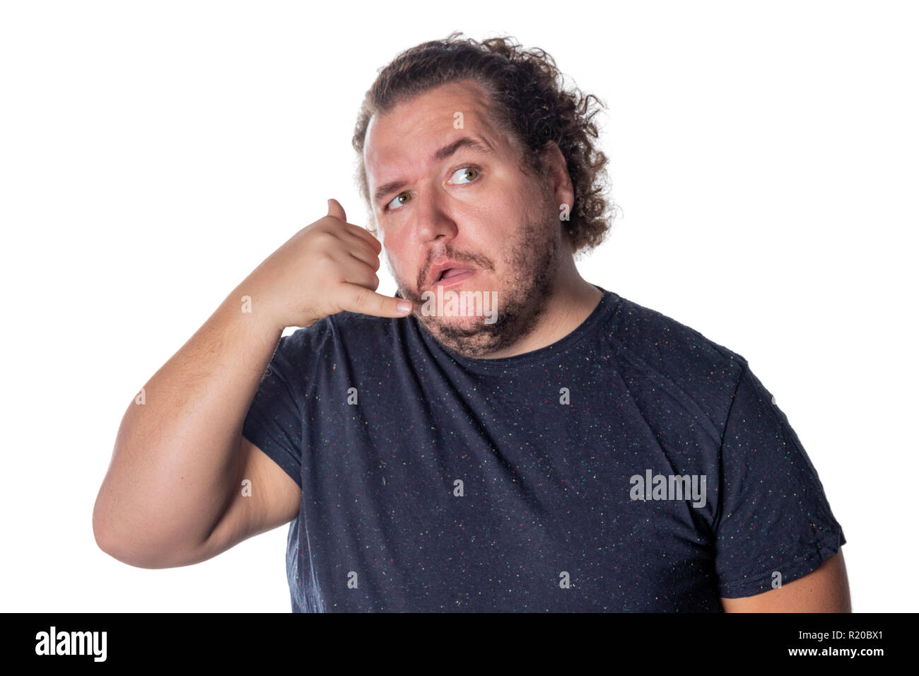 Fat handsome guy showing call me sign. Man in casual keeping hand at ...