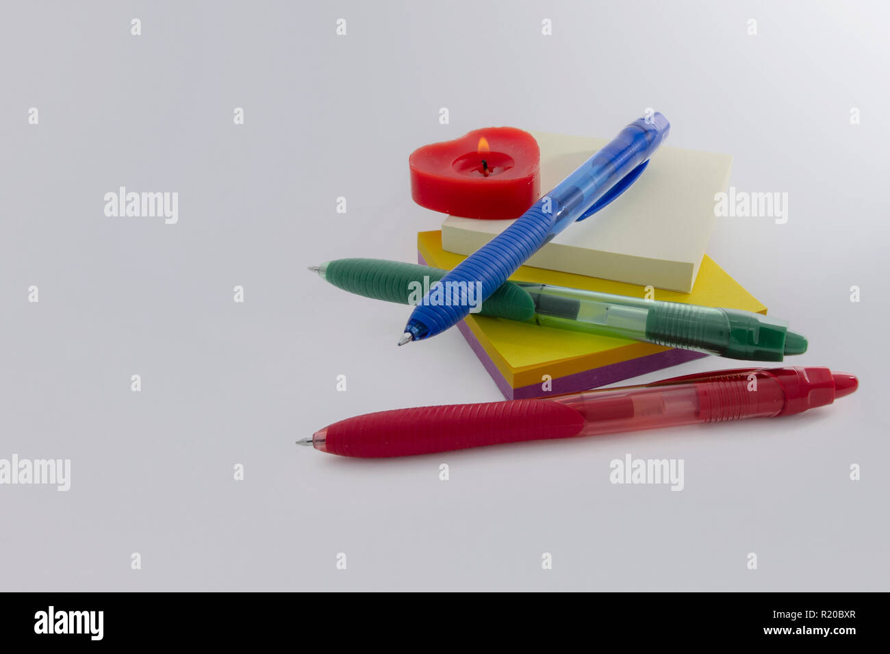 paper and pen, placed on a white background Stock Photo - Alamy