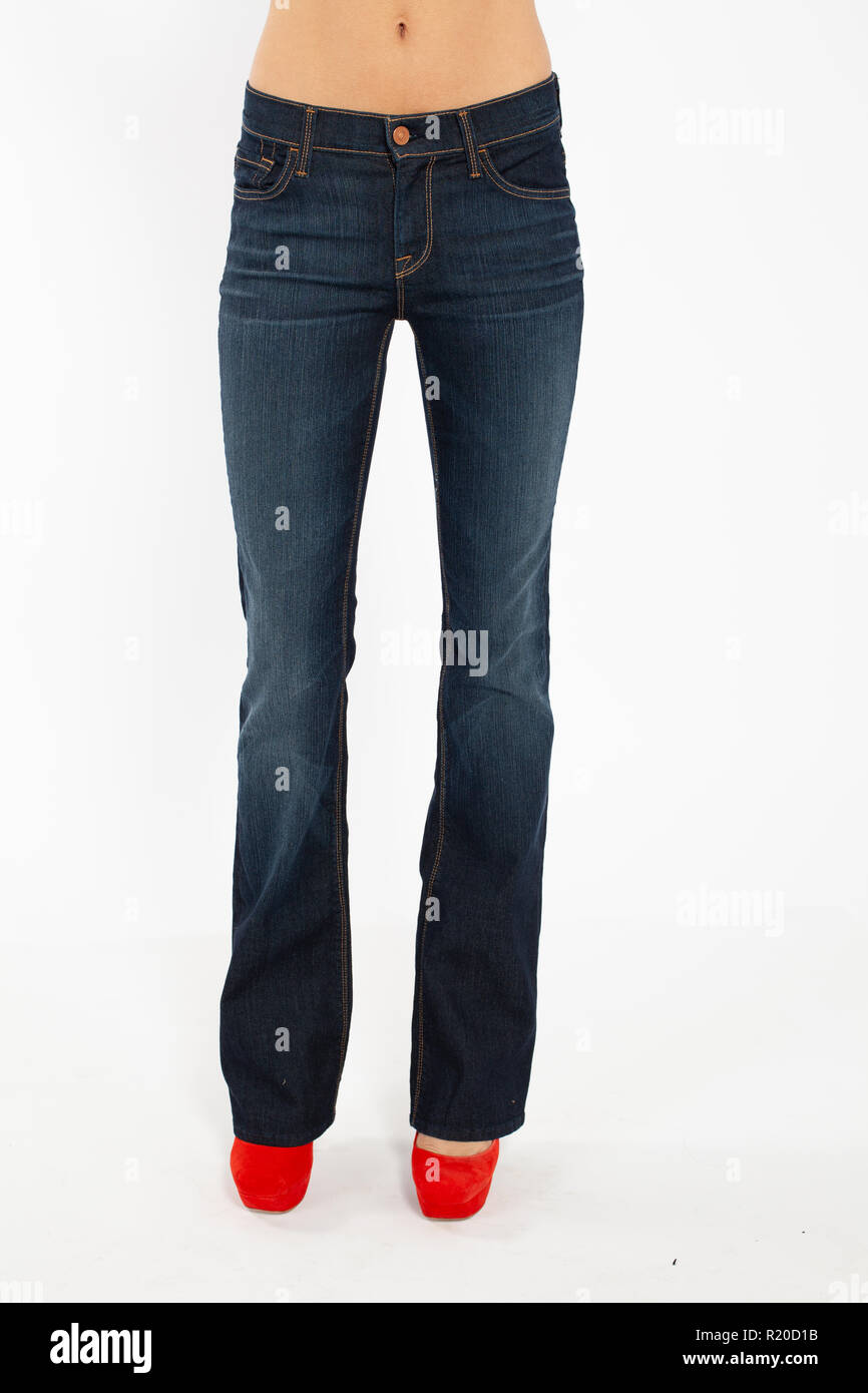 female model isolated on white background wearing denim blue jeans and ...