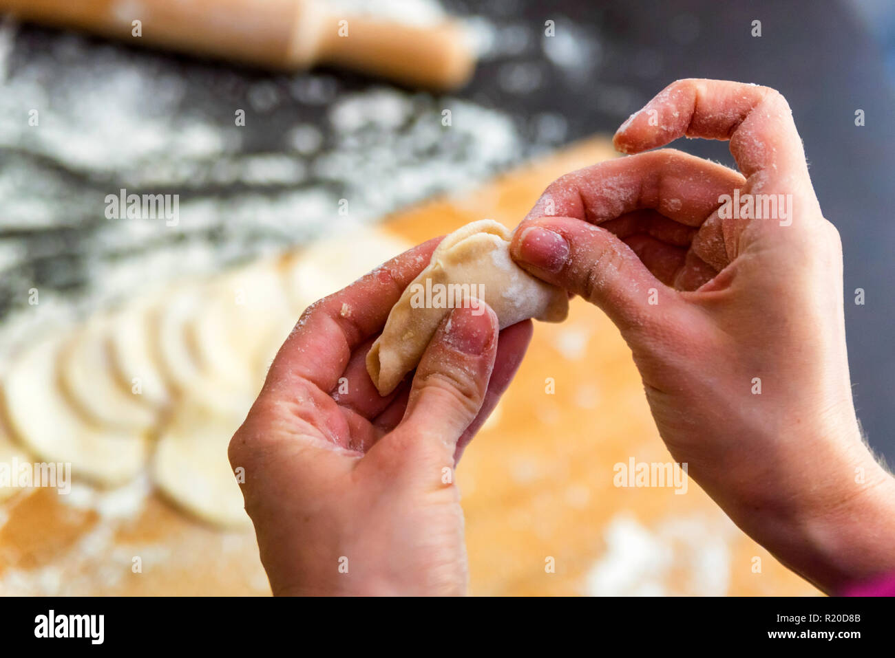 Making dumplings with stuffing at cooking master-class Stock Photo - Alamy