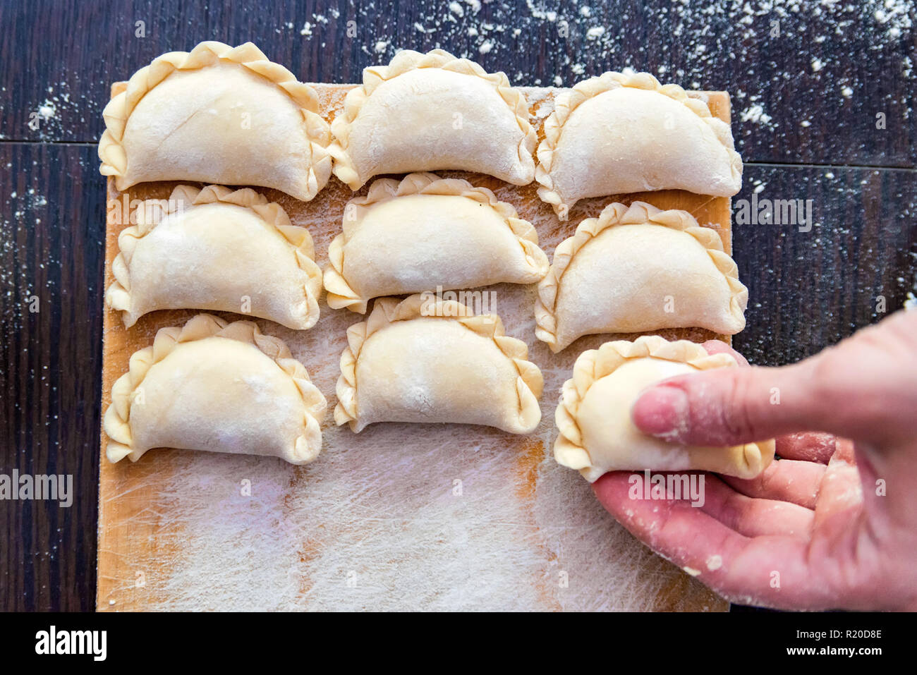 Making dumplings with stuffing at cooking master-class Stock Photo - Alamy