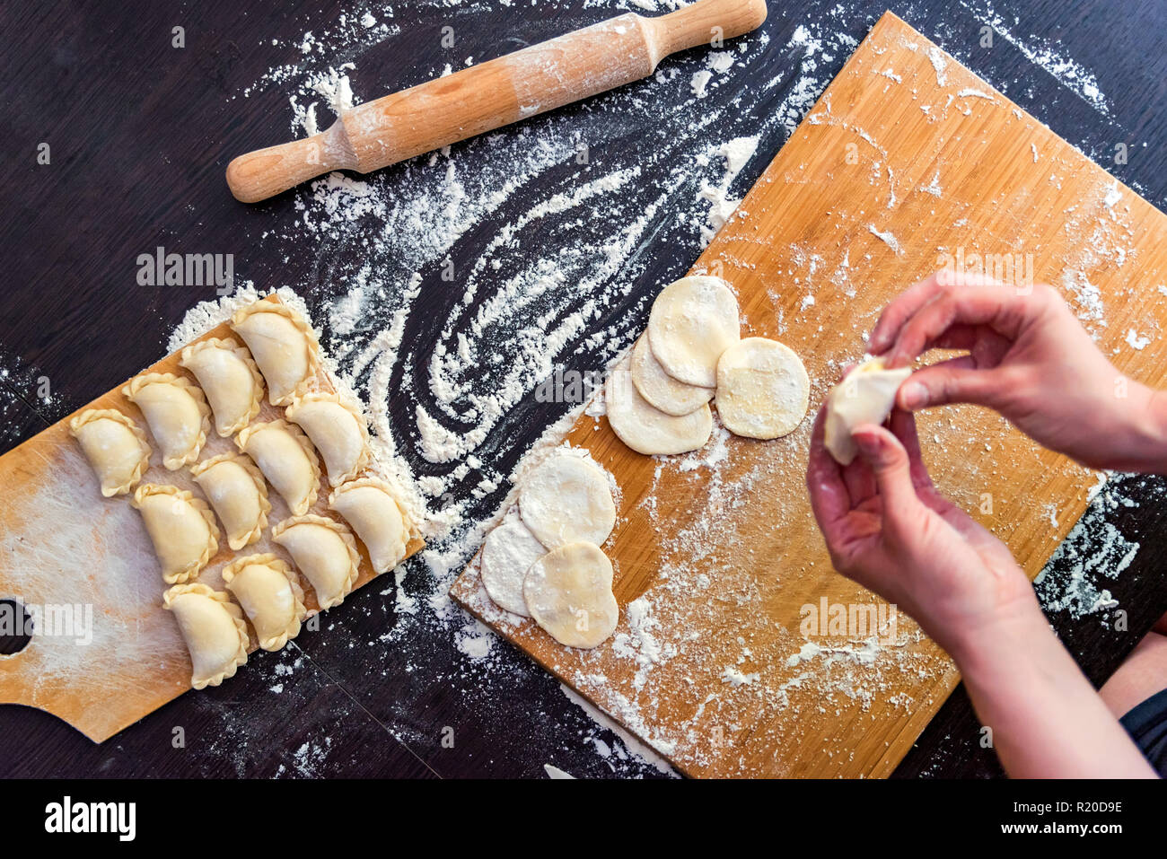 Making dumplings with stuffing at cooking master-class Stock Photo - Alamy