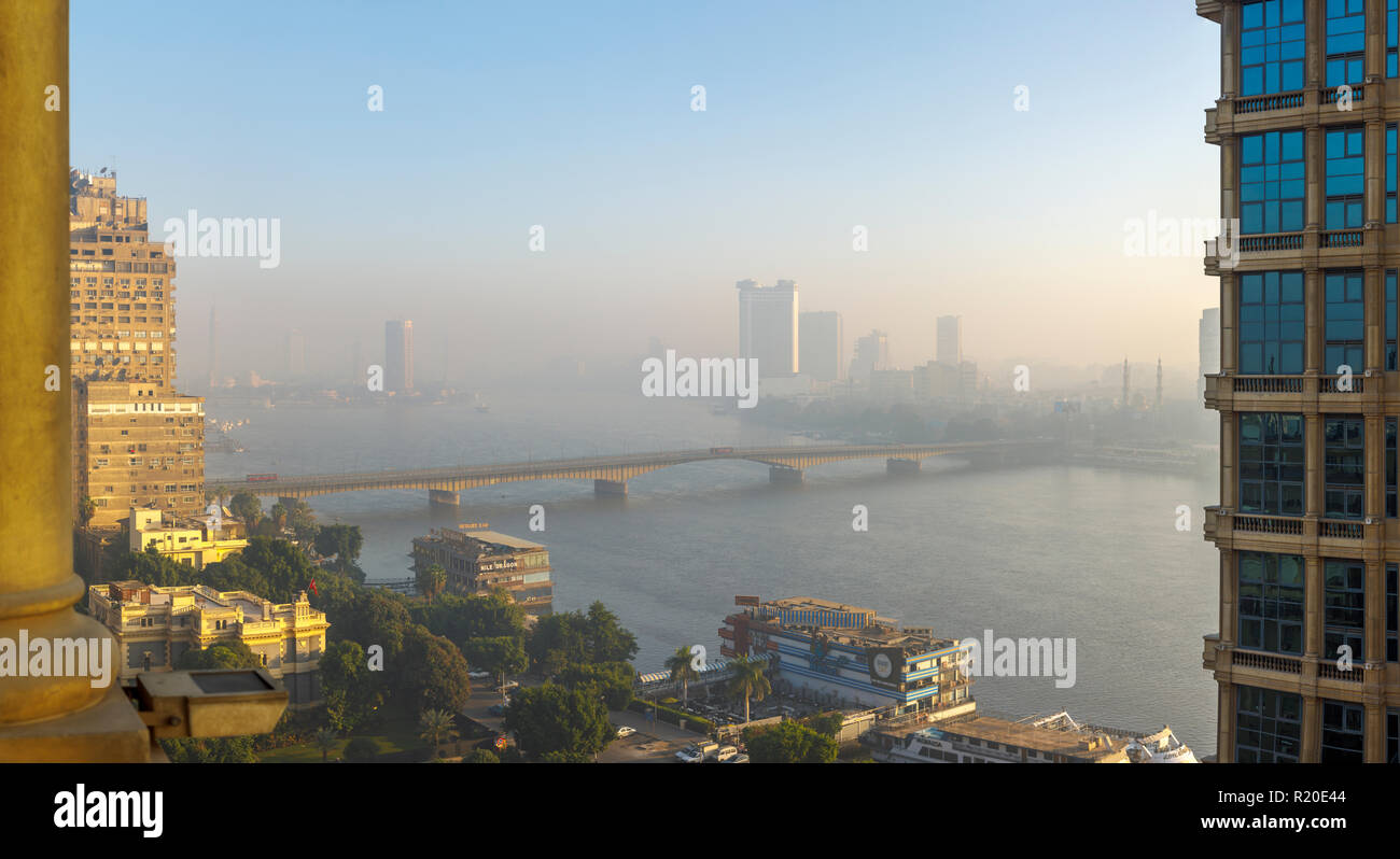 Cairo in Smog: smoggy view of Cairo University Bridge from Giza to ...