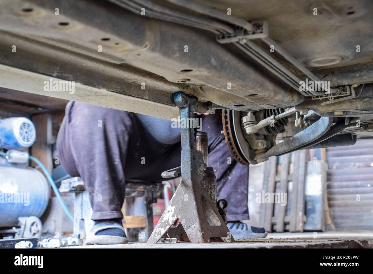 Forged car for a hundred. Car repair. Car view from below Stock Photo ...