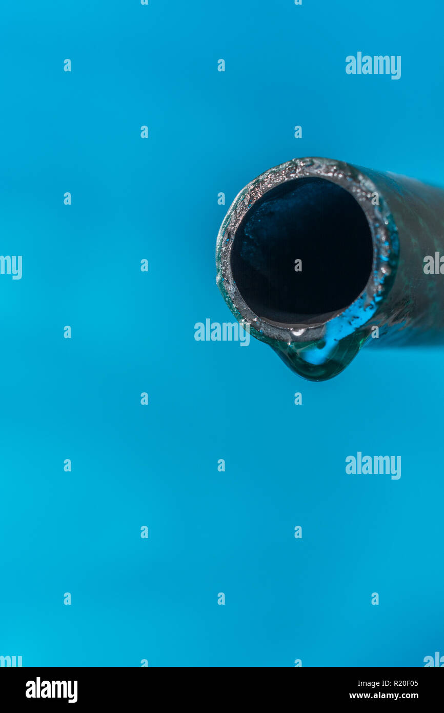 Plastic garden hosepipe / PVC hose pipe with last water drop against ...