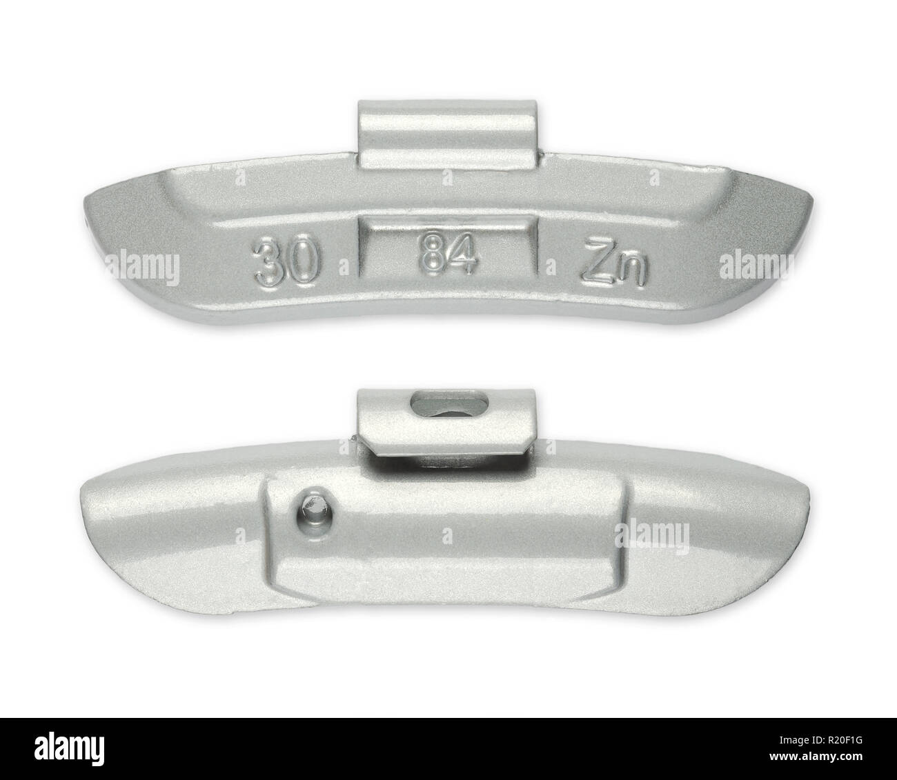 Clip-on zinc tire weight, front and back side, from above. Correction ...