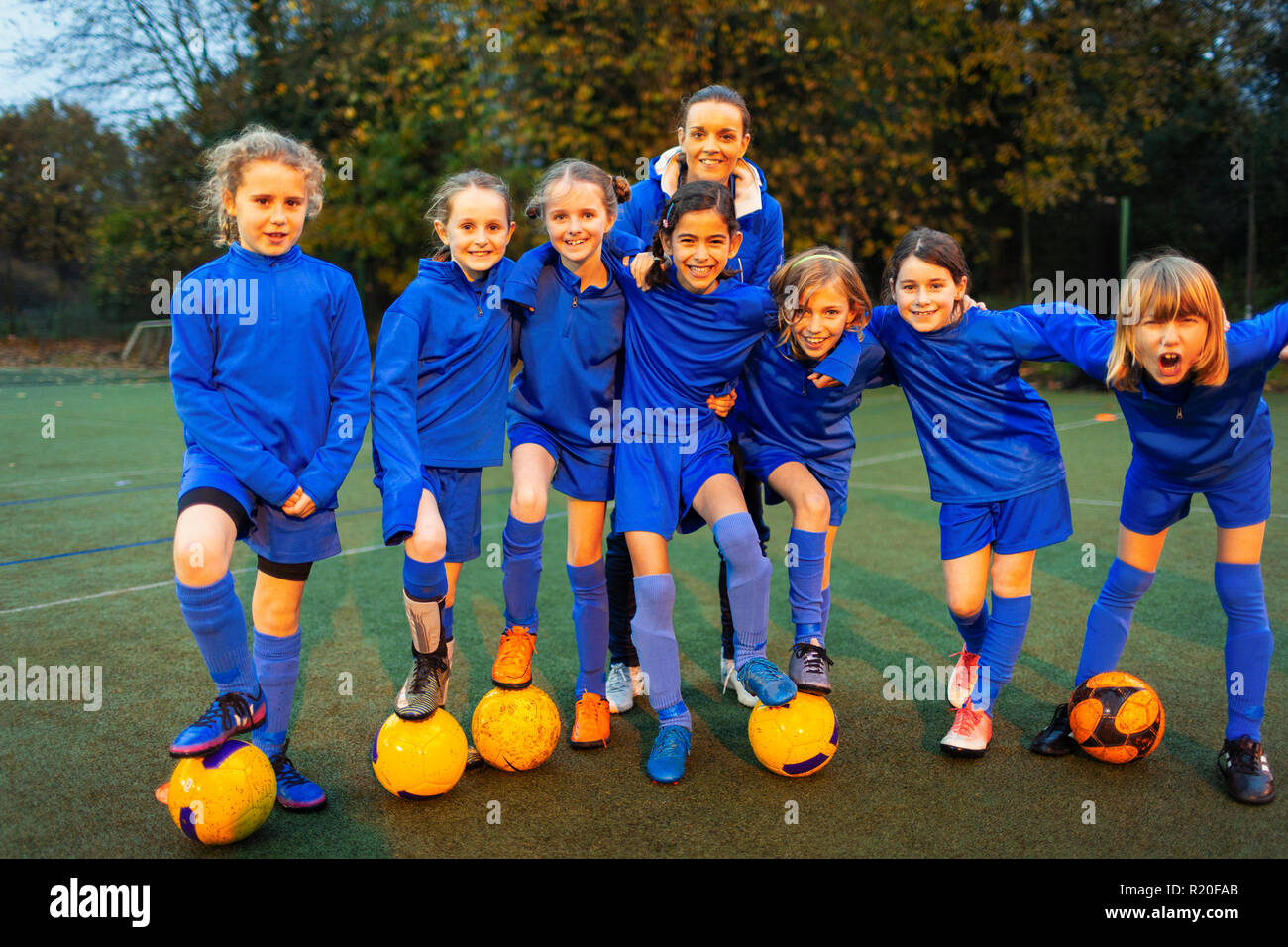 Girls playing soccer coach hi-res stock photography and images - Alamy