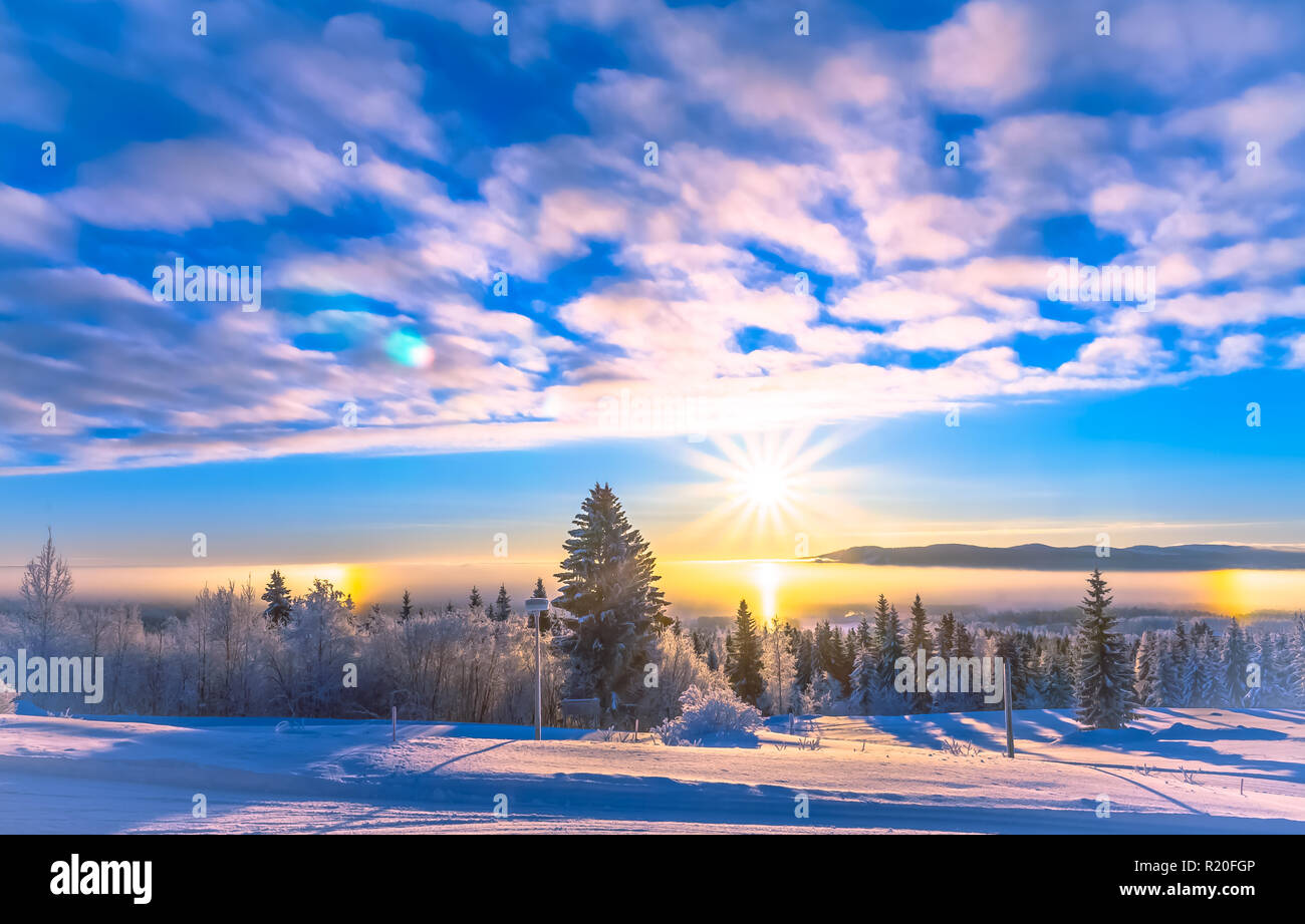 Sun halo effect in fog. Very cold January day in Sotkamo, Finland Stock ...