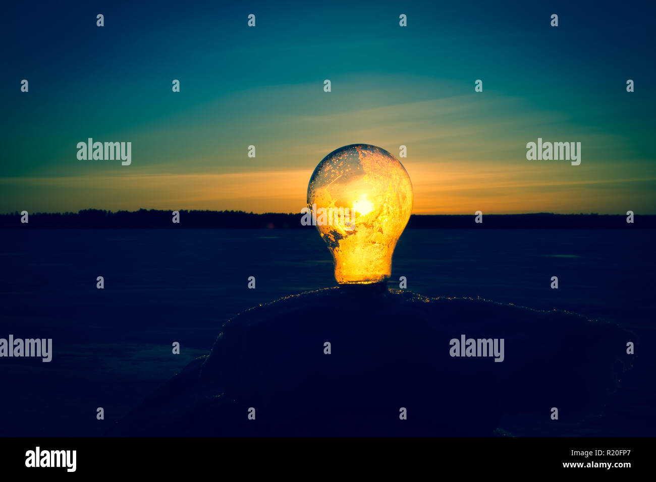 Sunset landscape glowing power symbol hi-res stock photography and ...