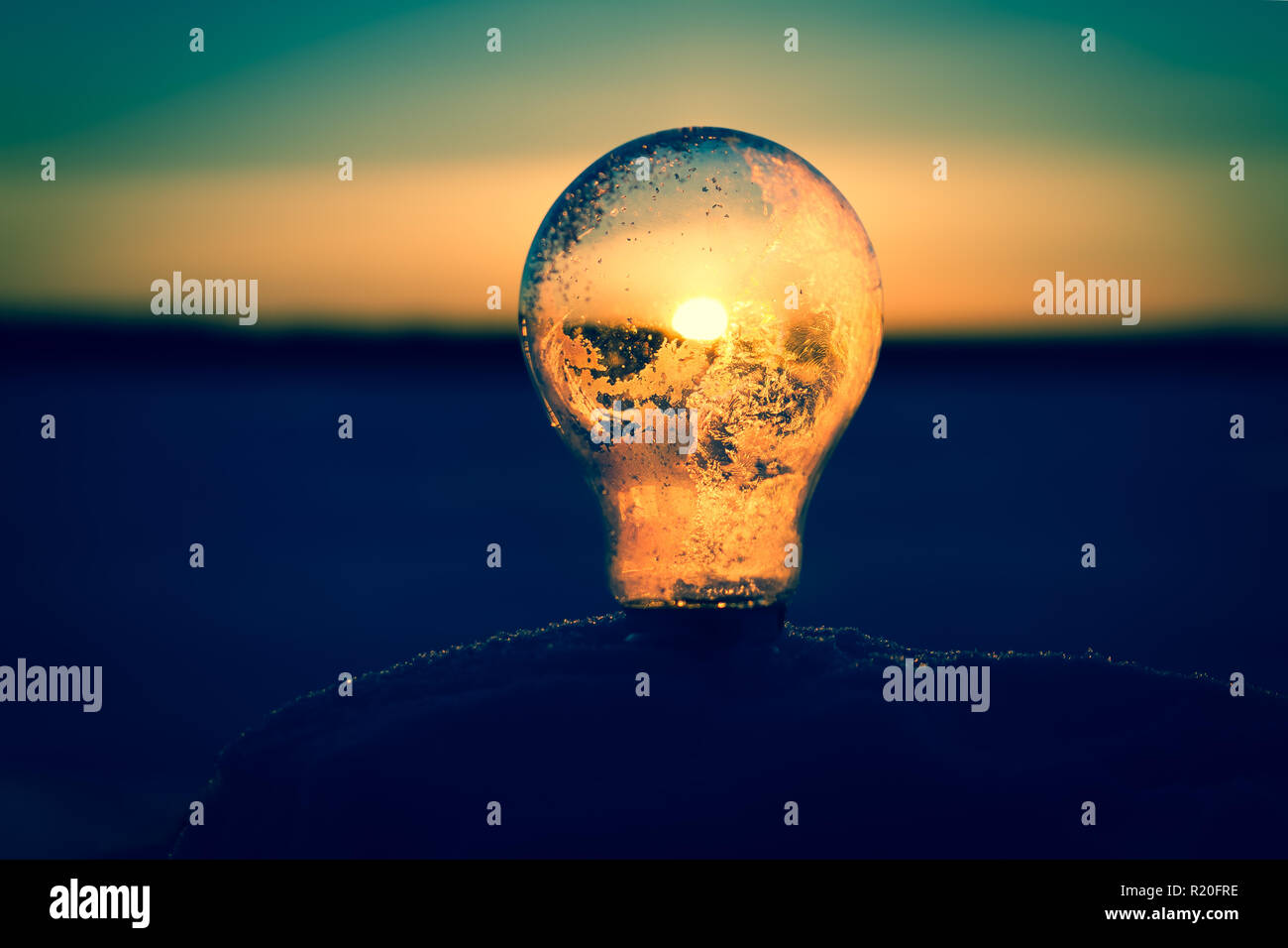 Sunset landscape glowing power symbol hi-res stock photography and ...