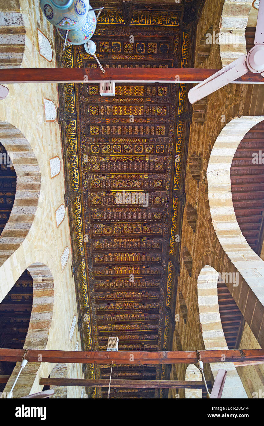 CAIRO, EGYPT - DECEMBER 21, 2017: Arabic calligraphy and golden Islamic ...