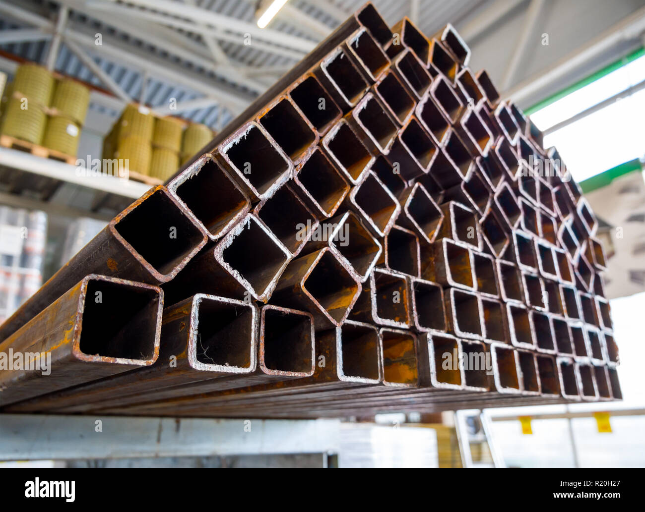 Square metal profile is on the rack Stock Photo - Alamy