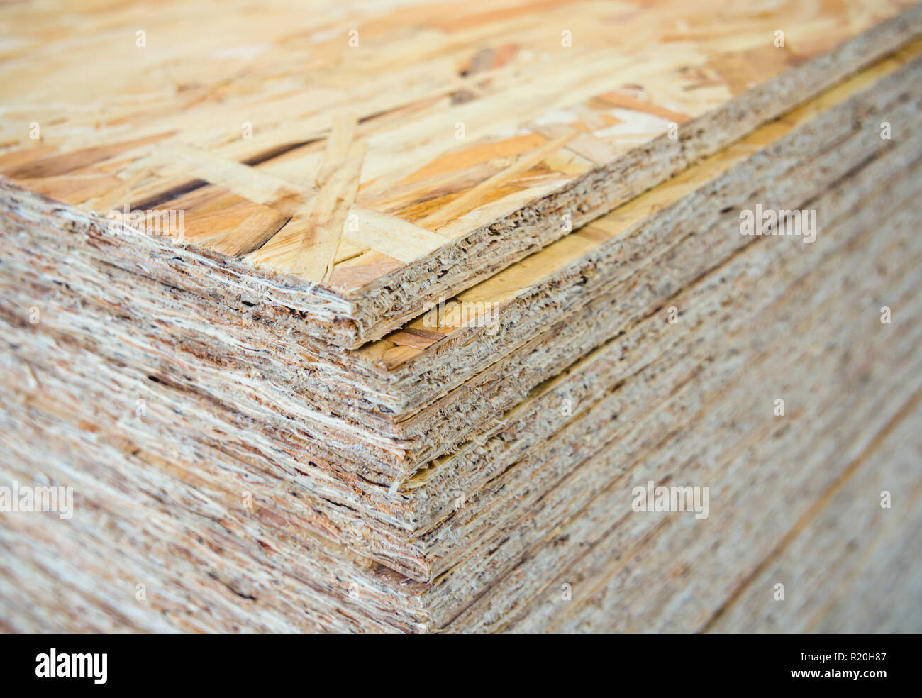 A stack of OSB sheets stacked one on another Stock Photo - Alamy