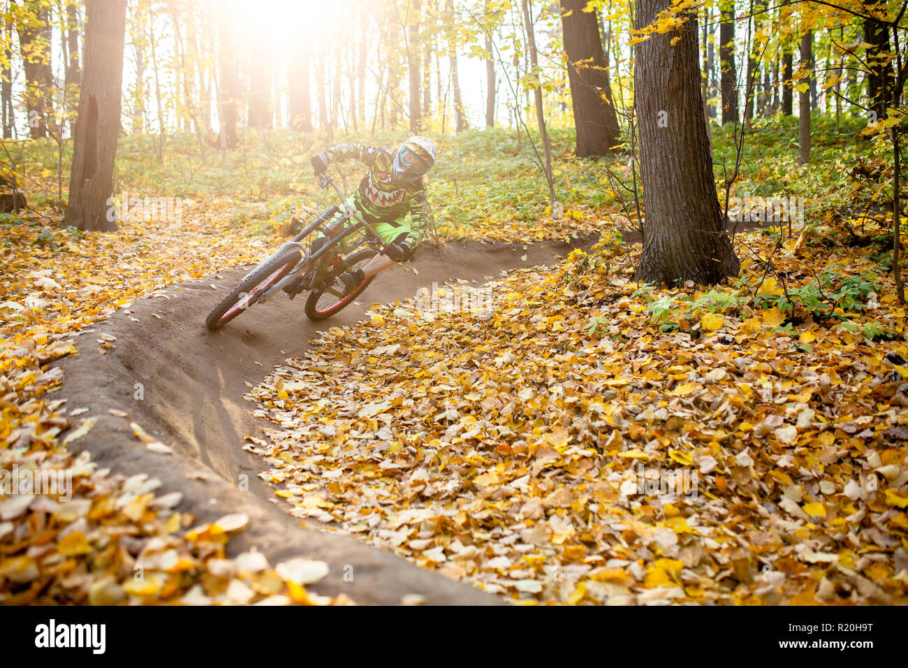 Image of sports man riding on sports bike Stock Photo - Alamy