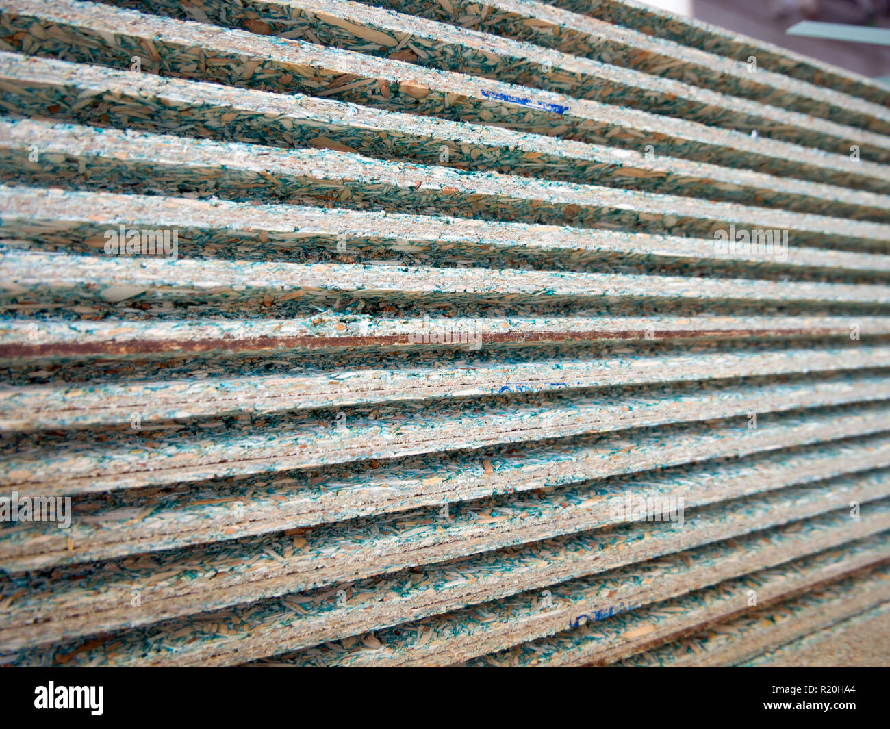 Side surface of a stack of sheets of laminated tongue-and-groove ...