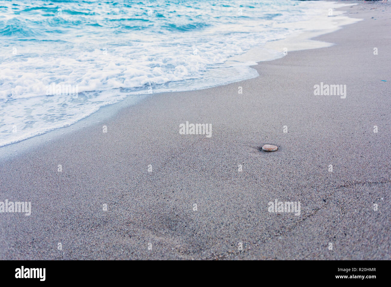 Blue waves in the sand Stock Photo - Alamy
