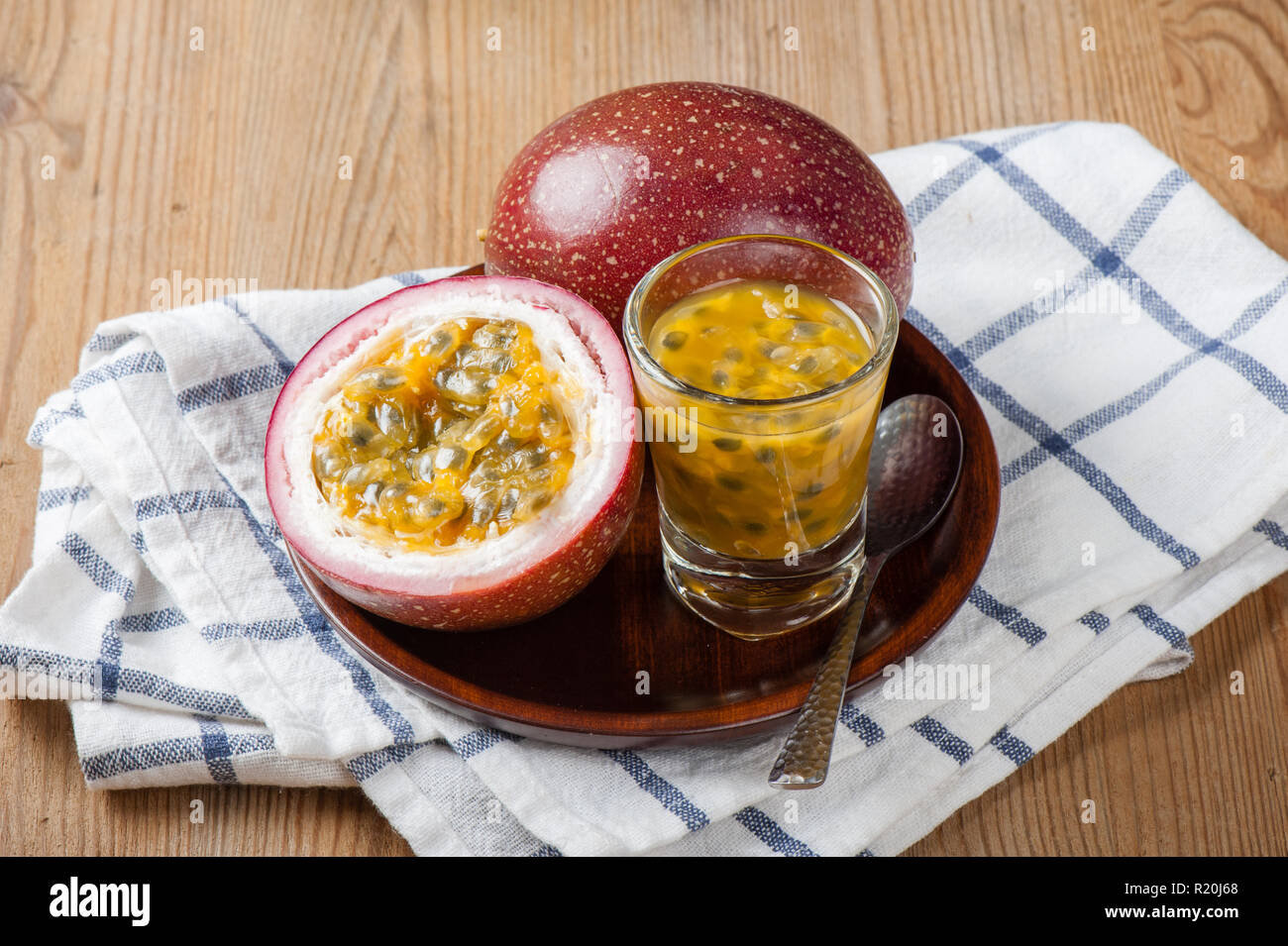 Fresh passion fruit on wooden background. Passion fruit contains many ...