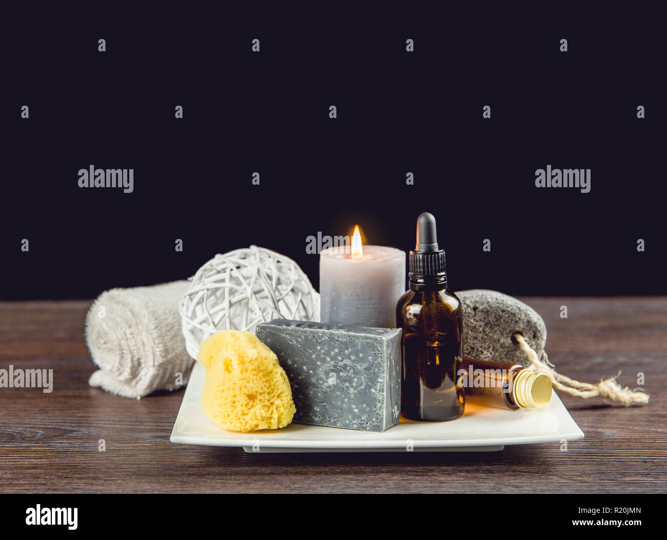 Man spa relaxation concept. Different day spa products on white ceramic ...