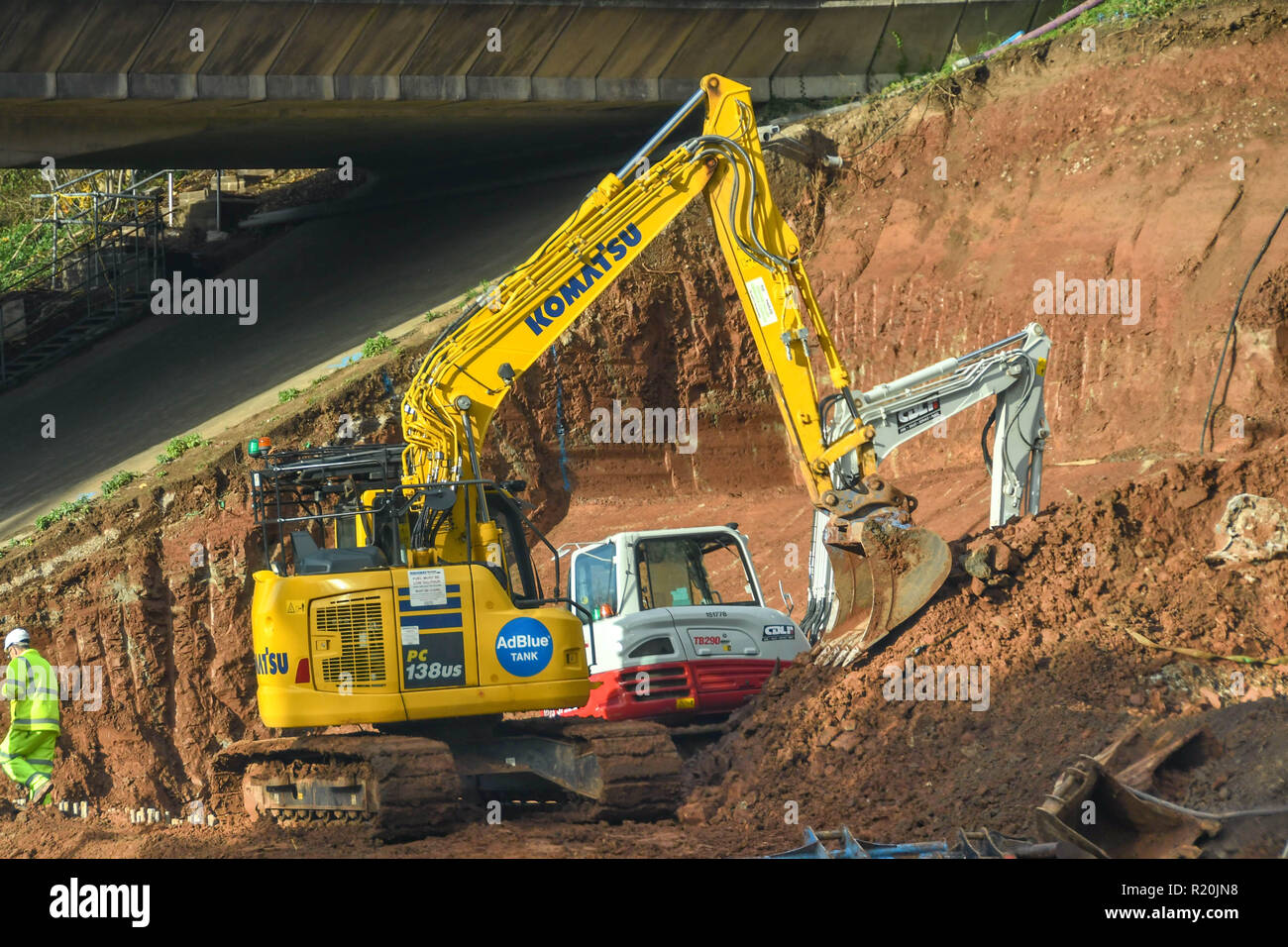 Excavators digging hi-res stock photography and images - Alamy
