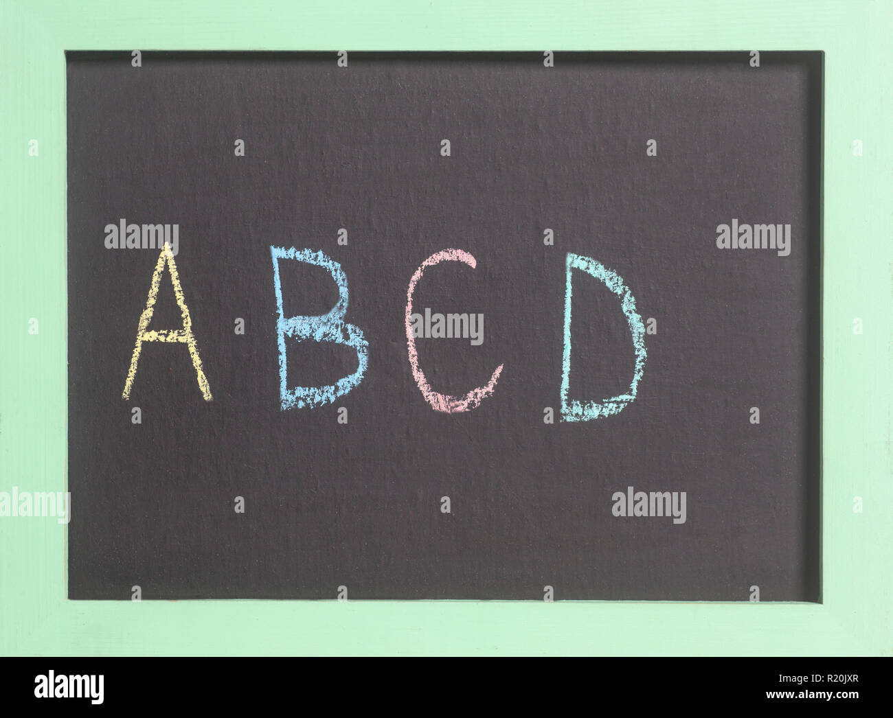 Chalkboard written A B C D close up Stock Photo - Alamy