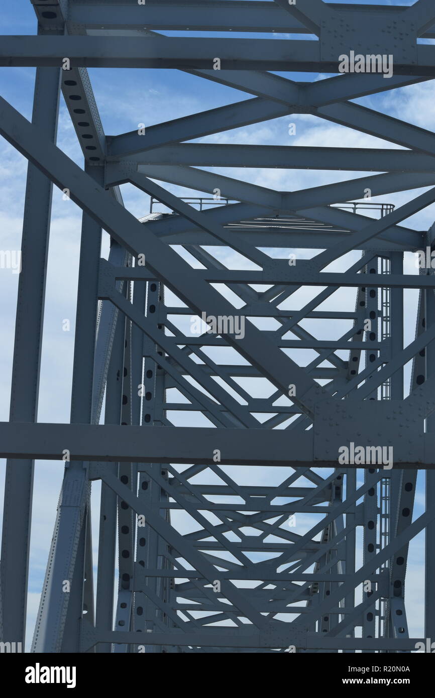 Heavy metal bridge in a blue cloudy sky Stock Photo - Alamy