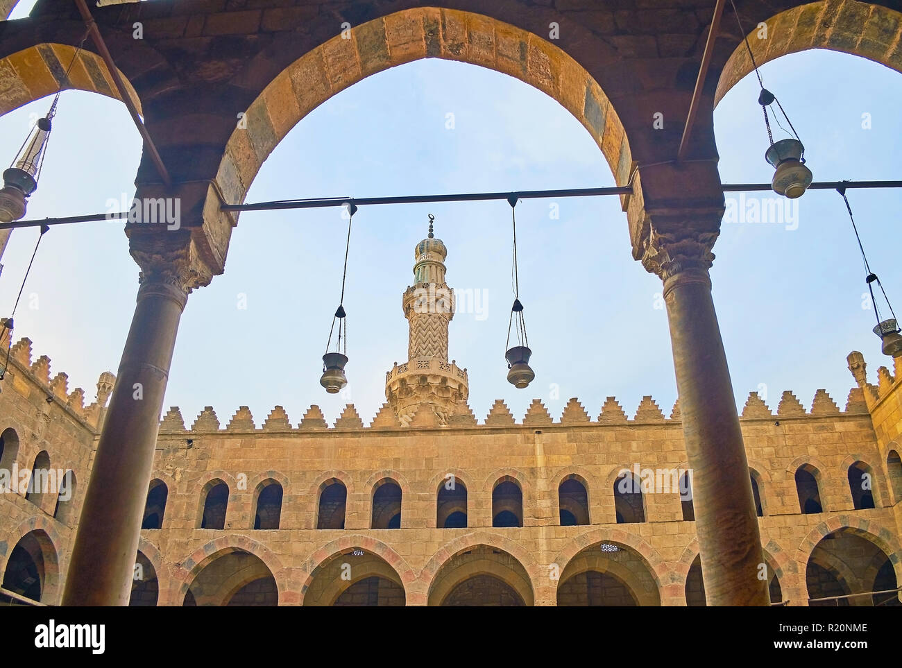 The view from the arcade of Al-Nasir Muhammad Mosque on its stone wall ...